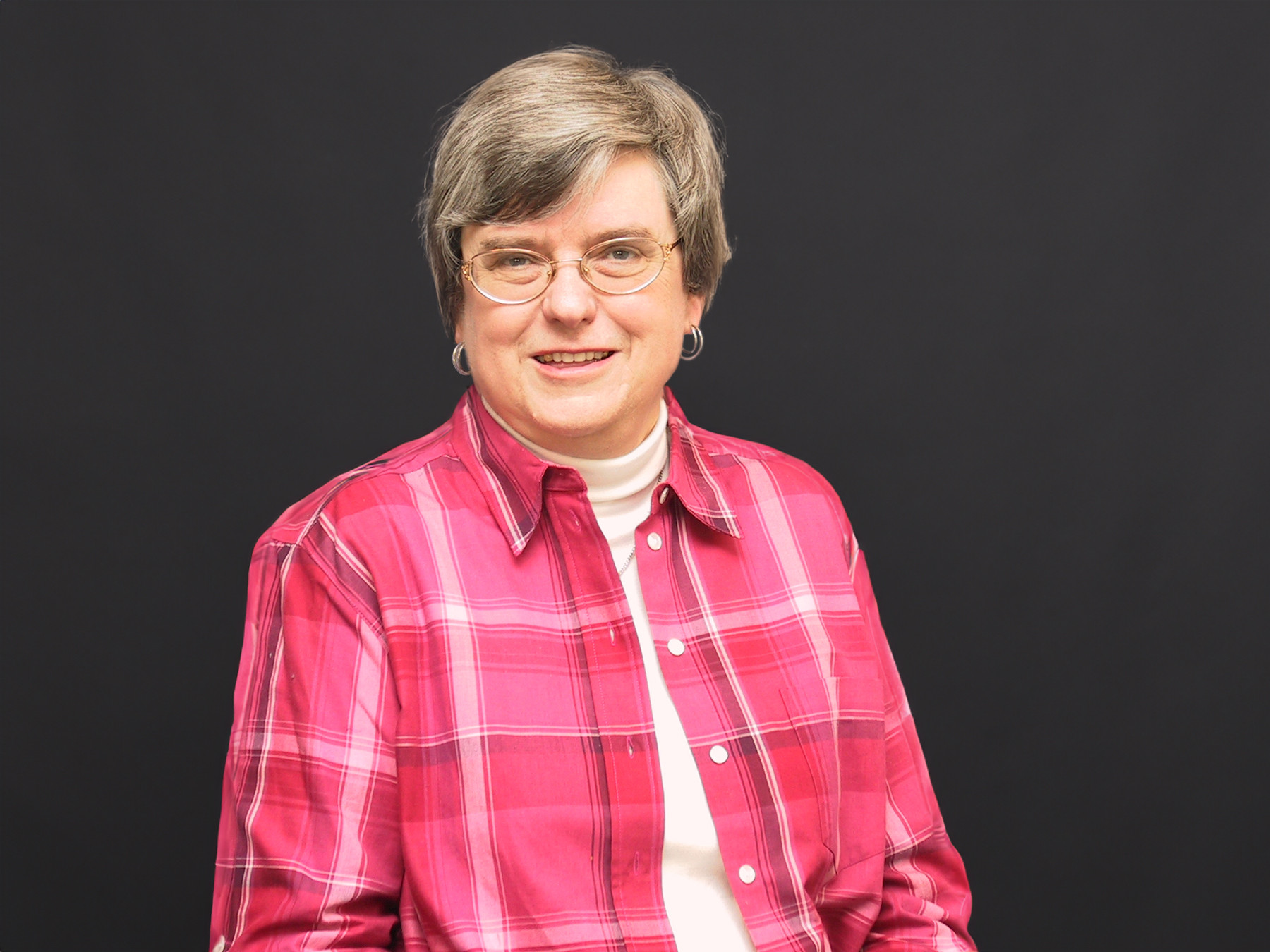 The “Crossing over” of Dr. Joan Carter | Ambrose University